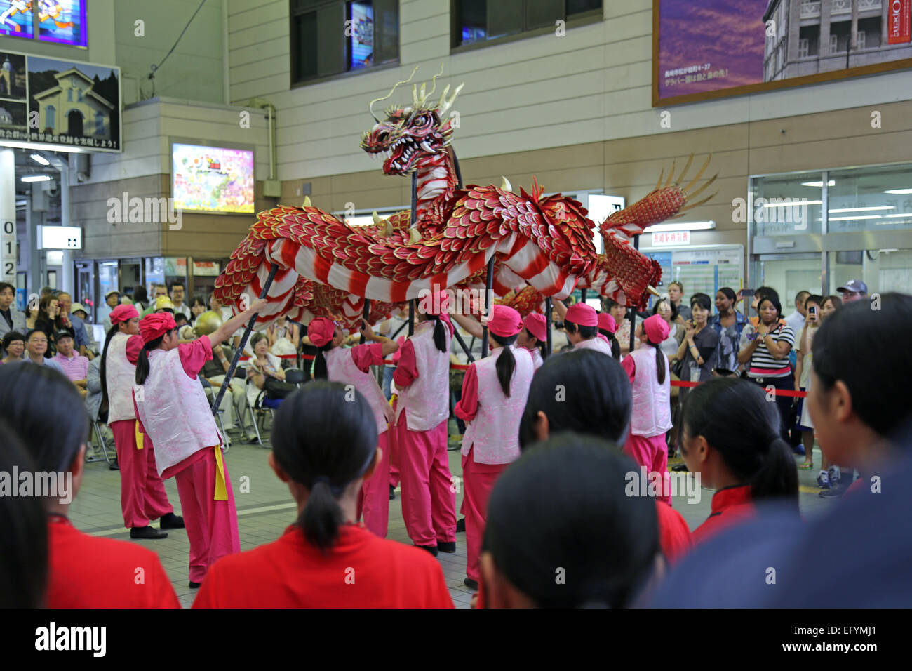Japanese high school girls performing a Chinese Dragon Dance ceremony ...