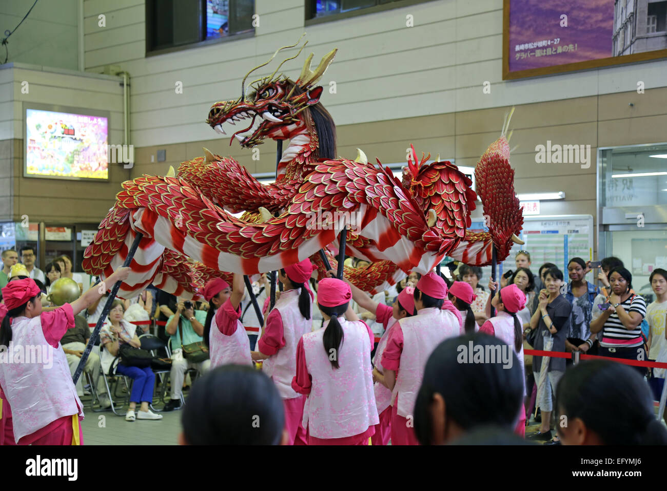 Japanese high school girls performing a Chinese Dragon Dance ceremony ...