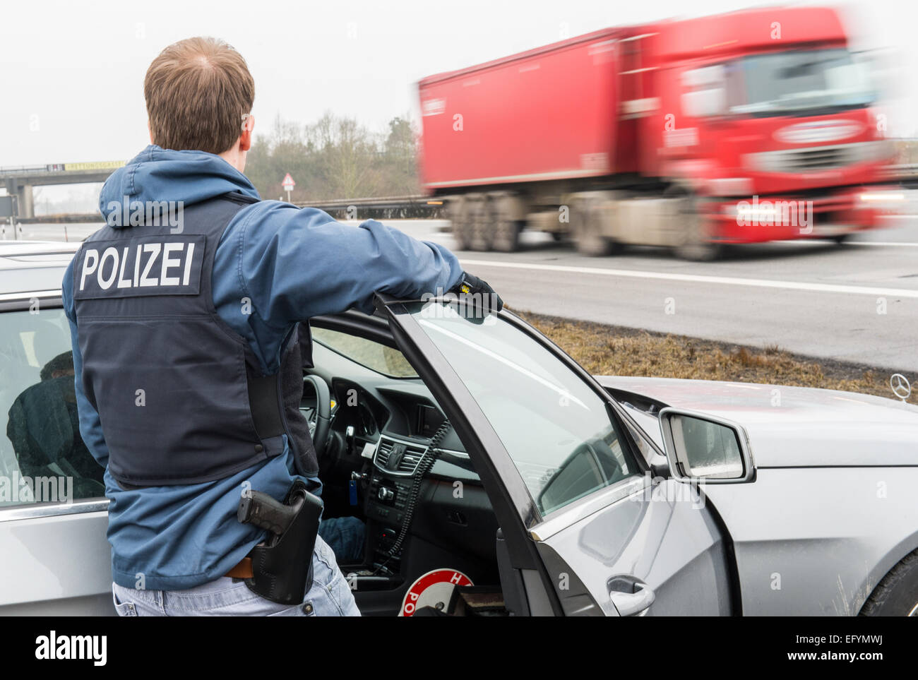 Passau, Germany. 12th Feb, 2015. An officer of the German federal ...