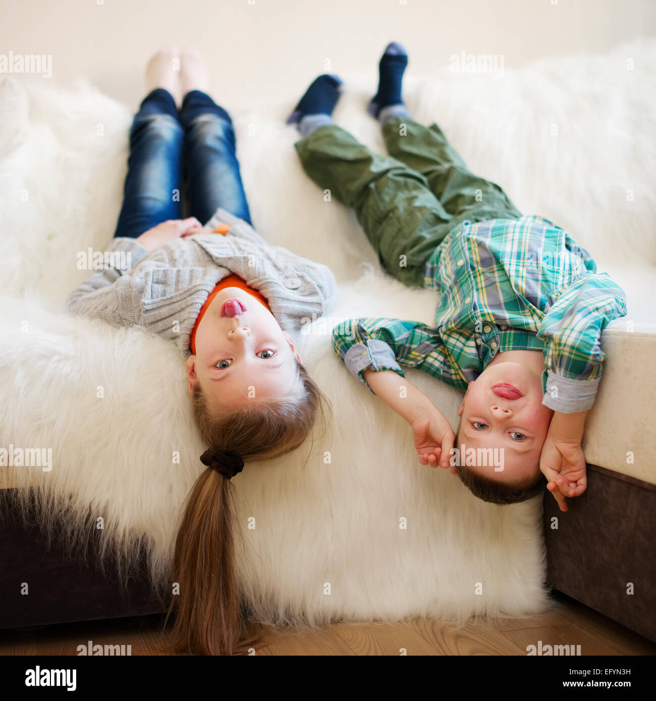 boy and girl fool upside down Stock Photo - Alamy