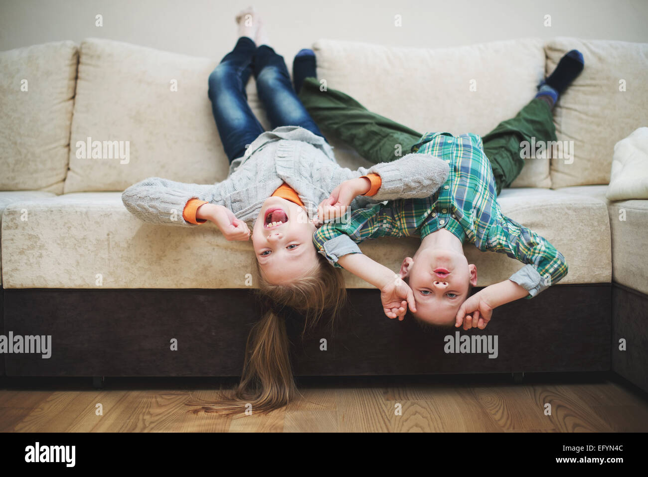 boy and girl fool upside down Stock Photo - Alamy