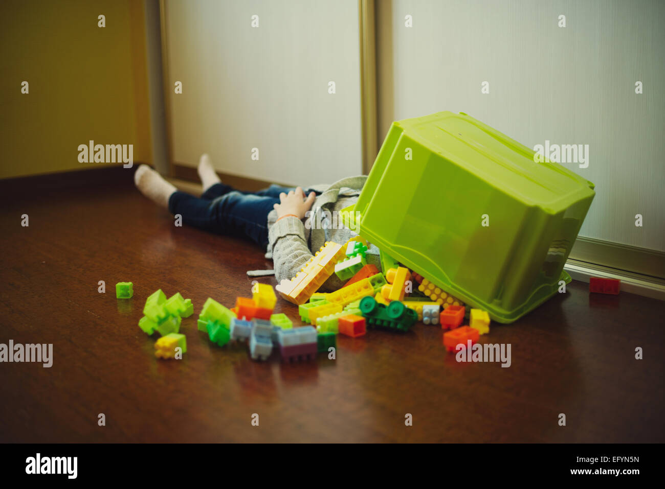 Happy beautiful girl plays with blocks Stock Photo - Alamy