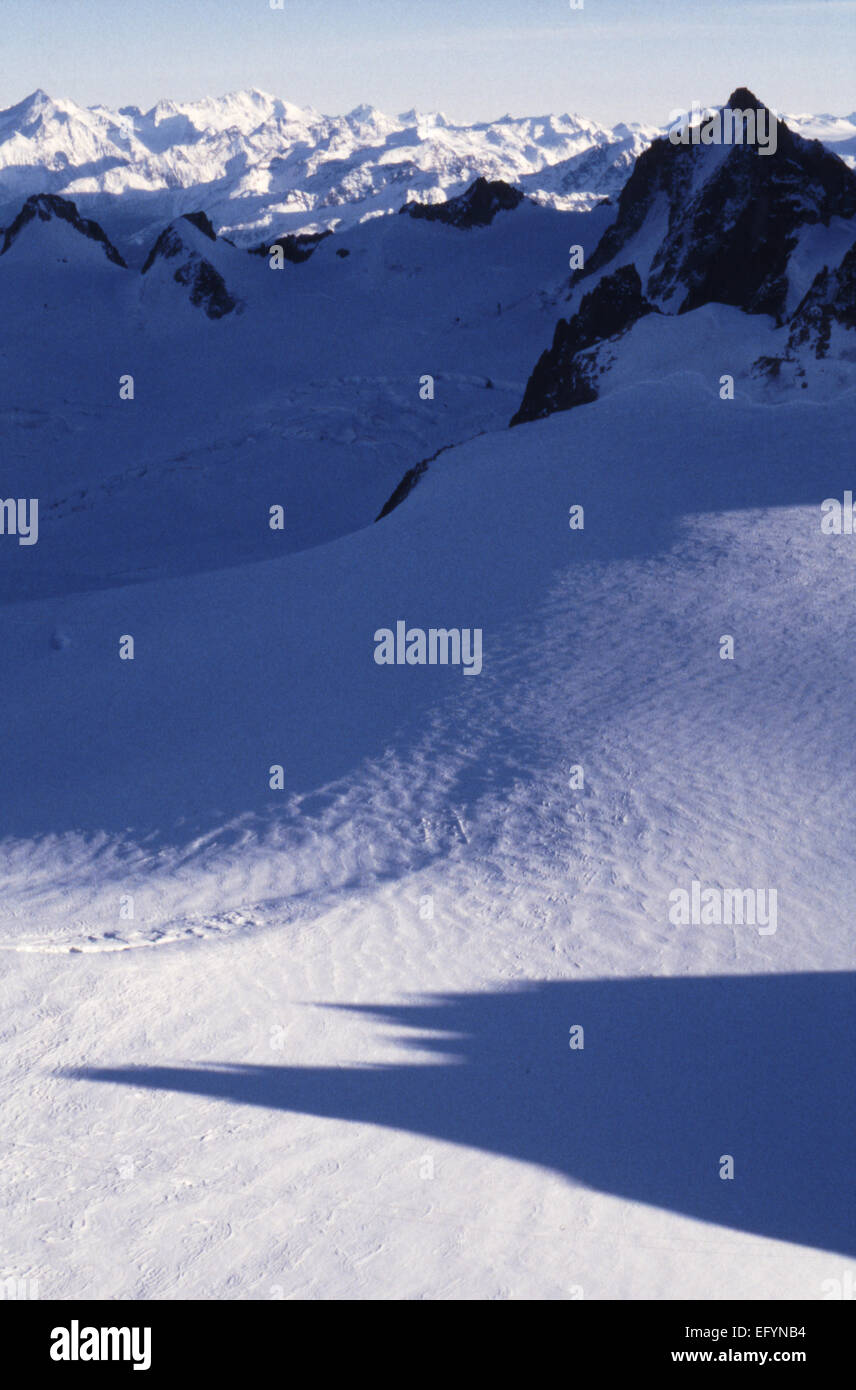 shadows of giant peaks looking across Vallee Blanche Stock Photo - Alamy