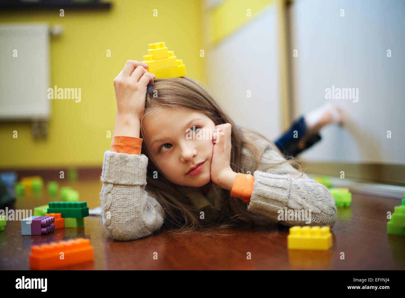 Child blocks hi-res stock photography and images - Alamy