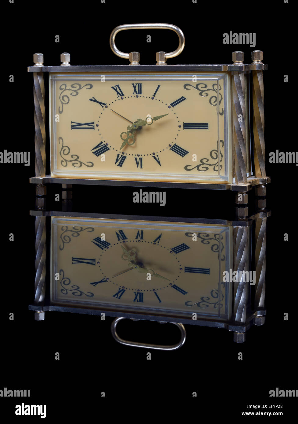Clock on black background and its reflection Stock Photo - Alamy