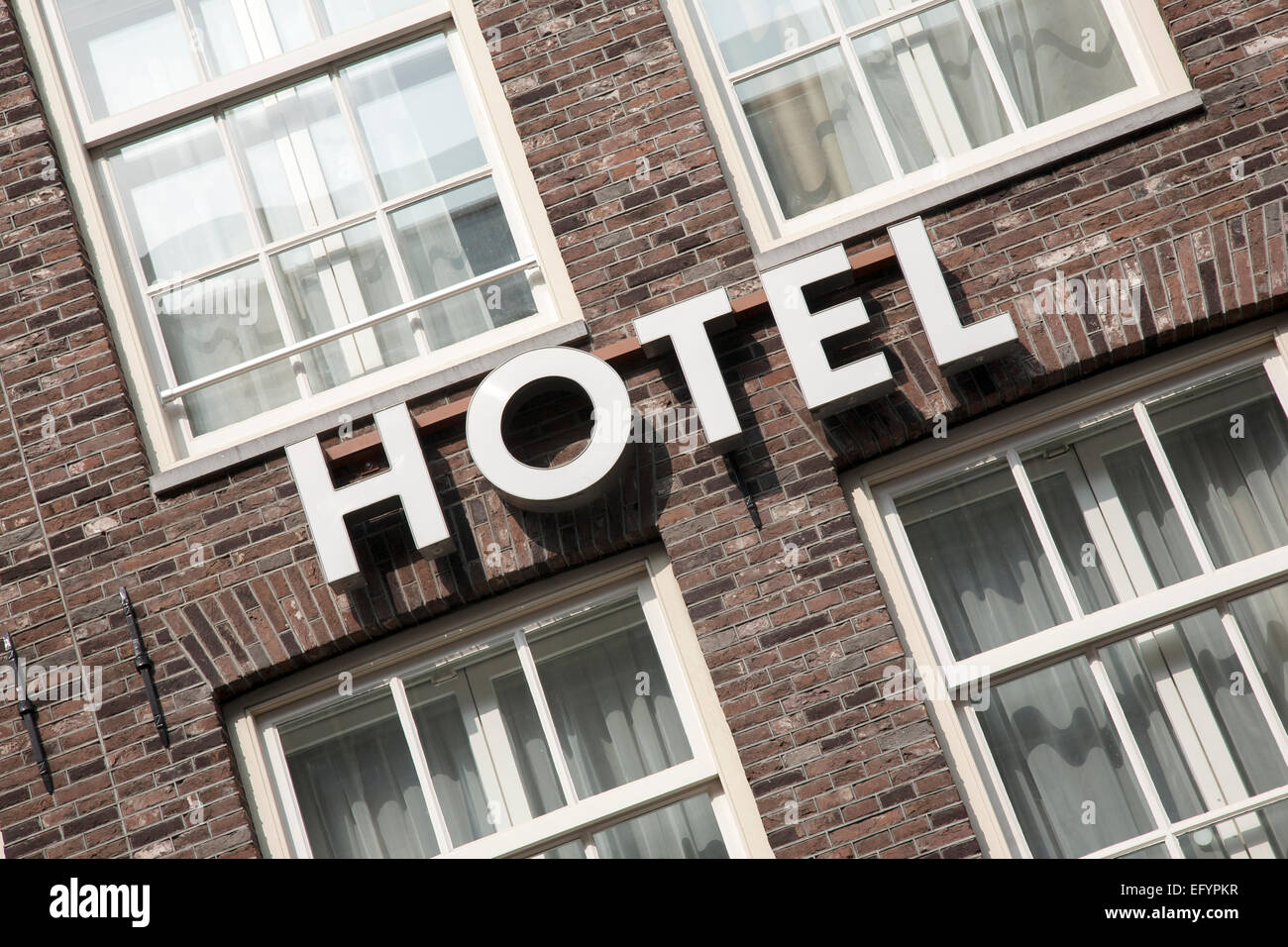 Hotel Sign on Brick Facade Stock Photo - Alamy