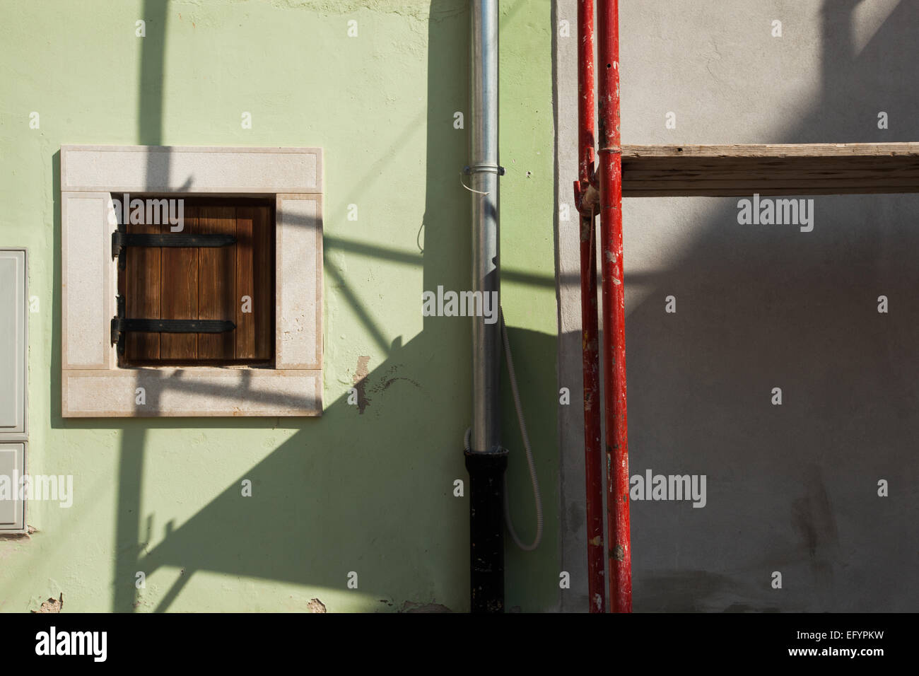 Window with a shadow on it Stock Photo - Alamy