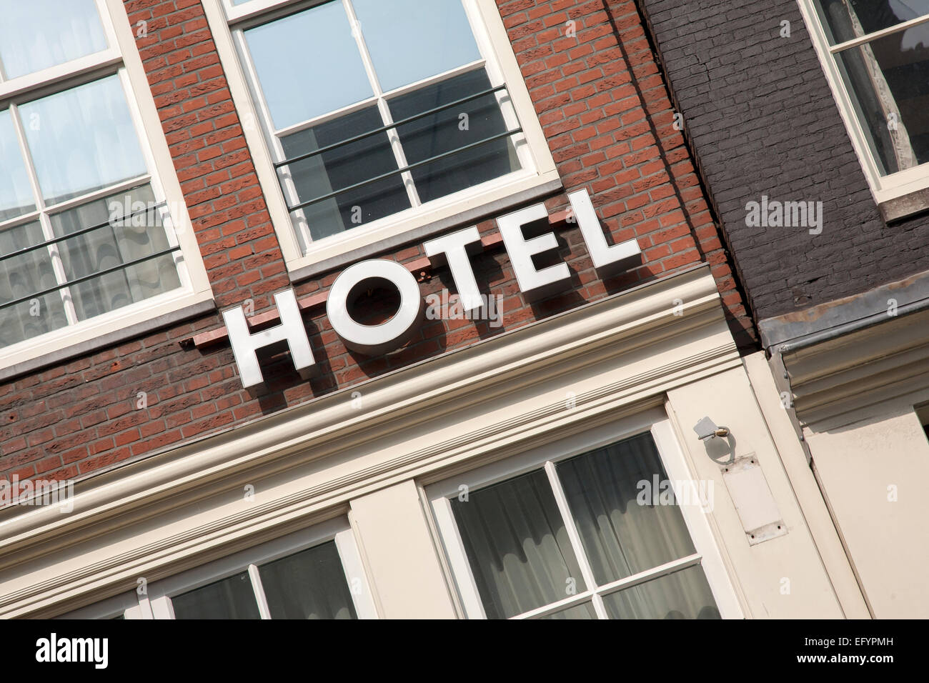 Hotel Sign on Brick Facade Stock Photo - Alamy