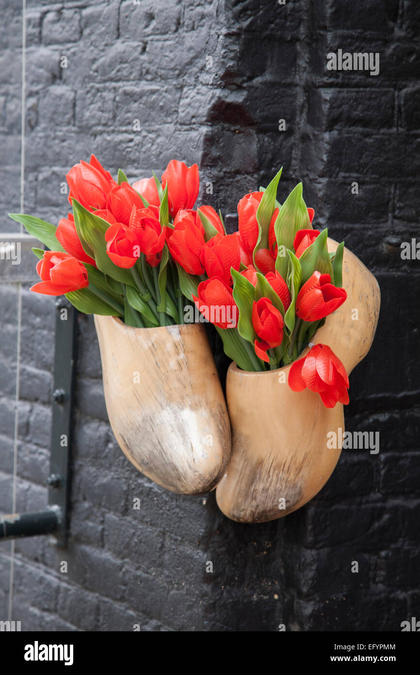 Traditional Clogs and Tulips outside Restaurant in Amsterdam, Holland ...