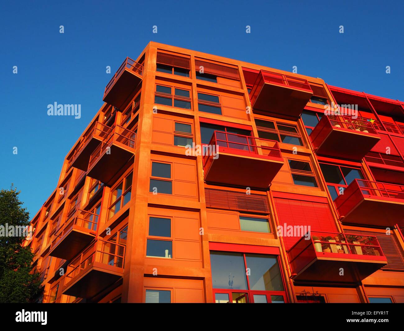 A modern red building with luxury flats is seen in Berlin Schoeneberg ...
