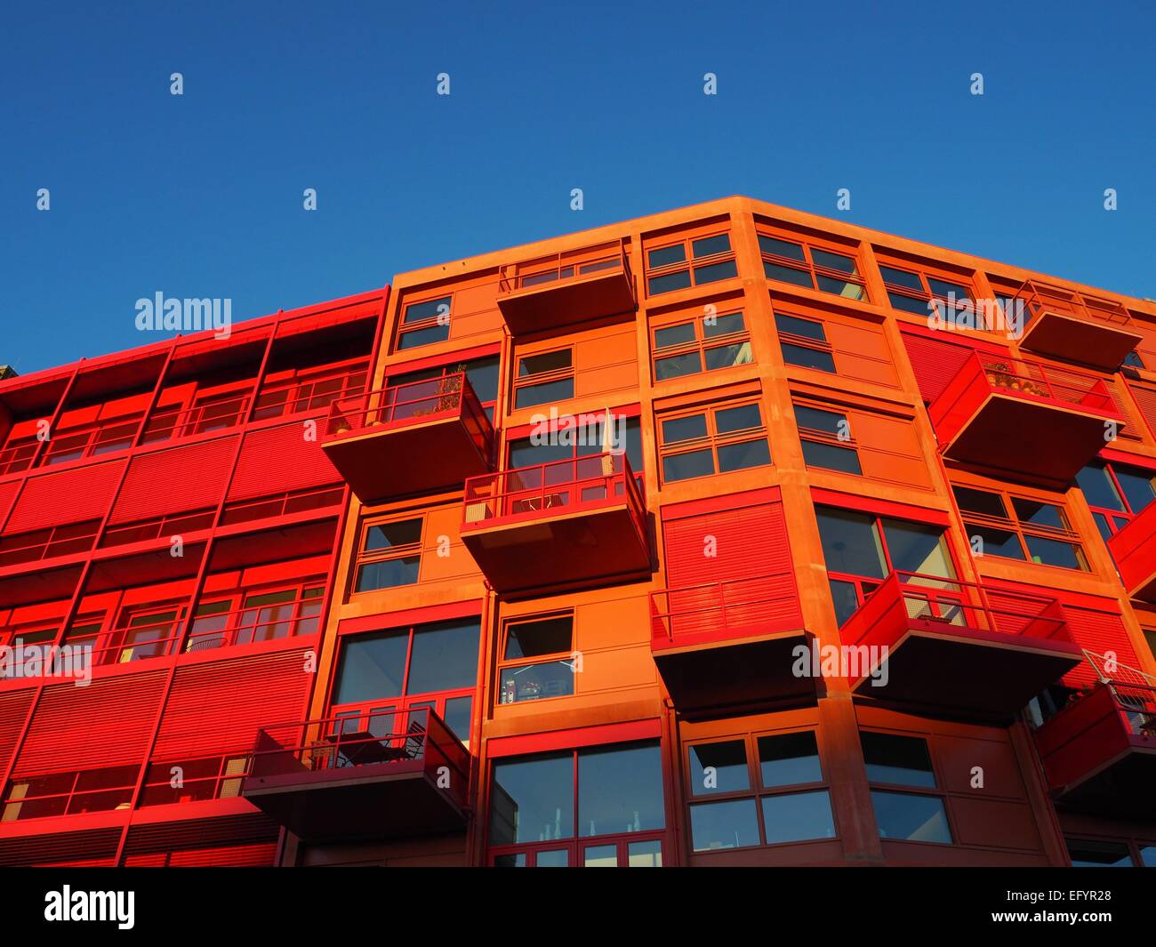A modern red building with luxury flats is seen in Berlin Schoeneberg ...