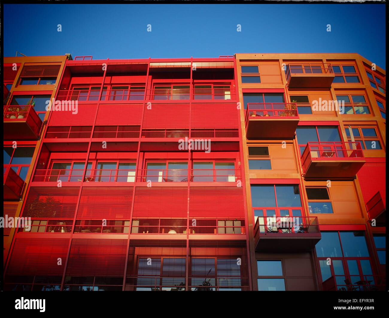 A modern red building with luxury flats is seen in Berlin Schoeneberg ...