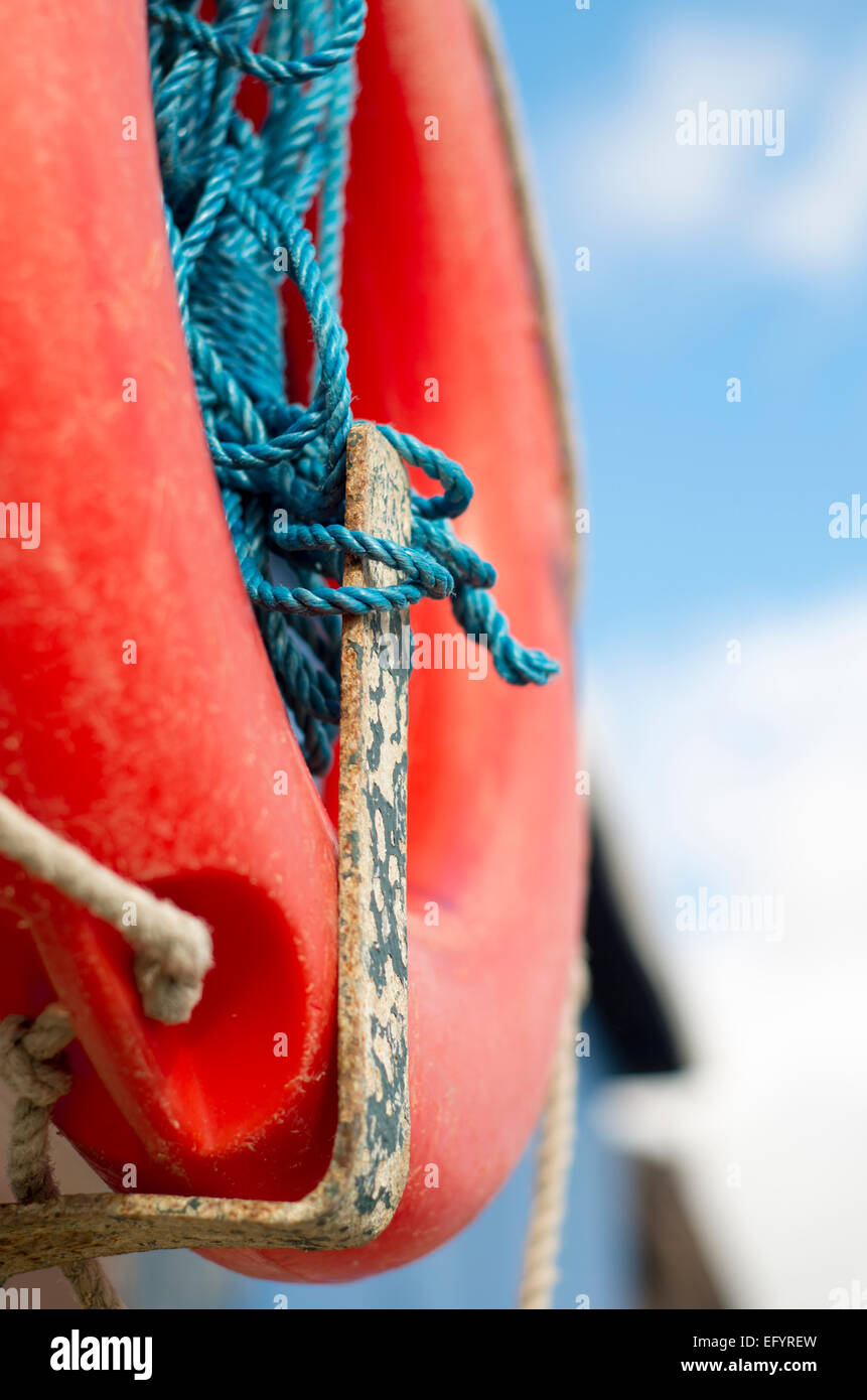 Life preserver ring / life buoy and blue rope at coast Walton on the ...