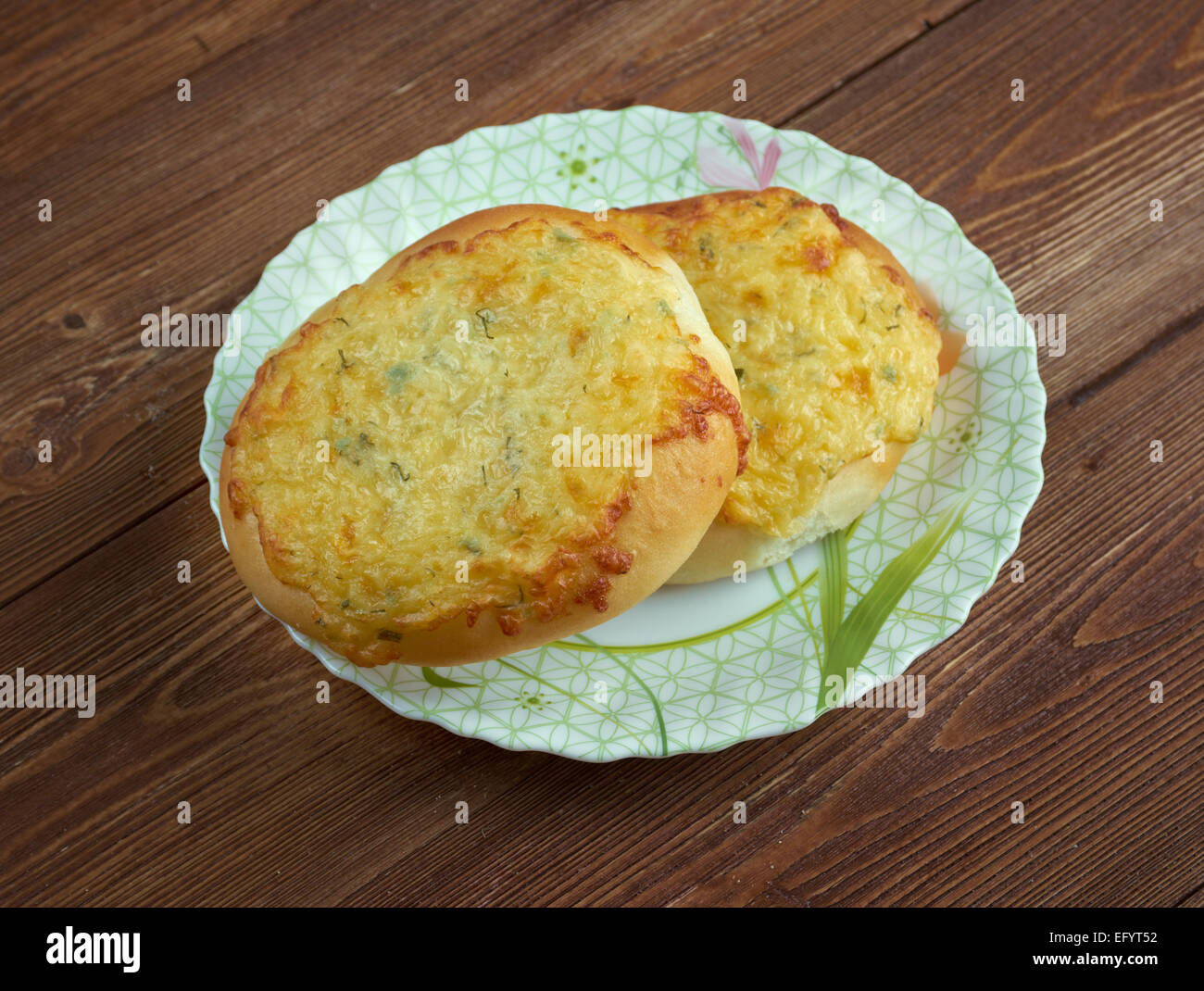 shangi- patties with cottage cheese Russian pastry.on a wood background ...