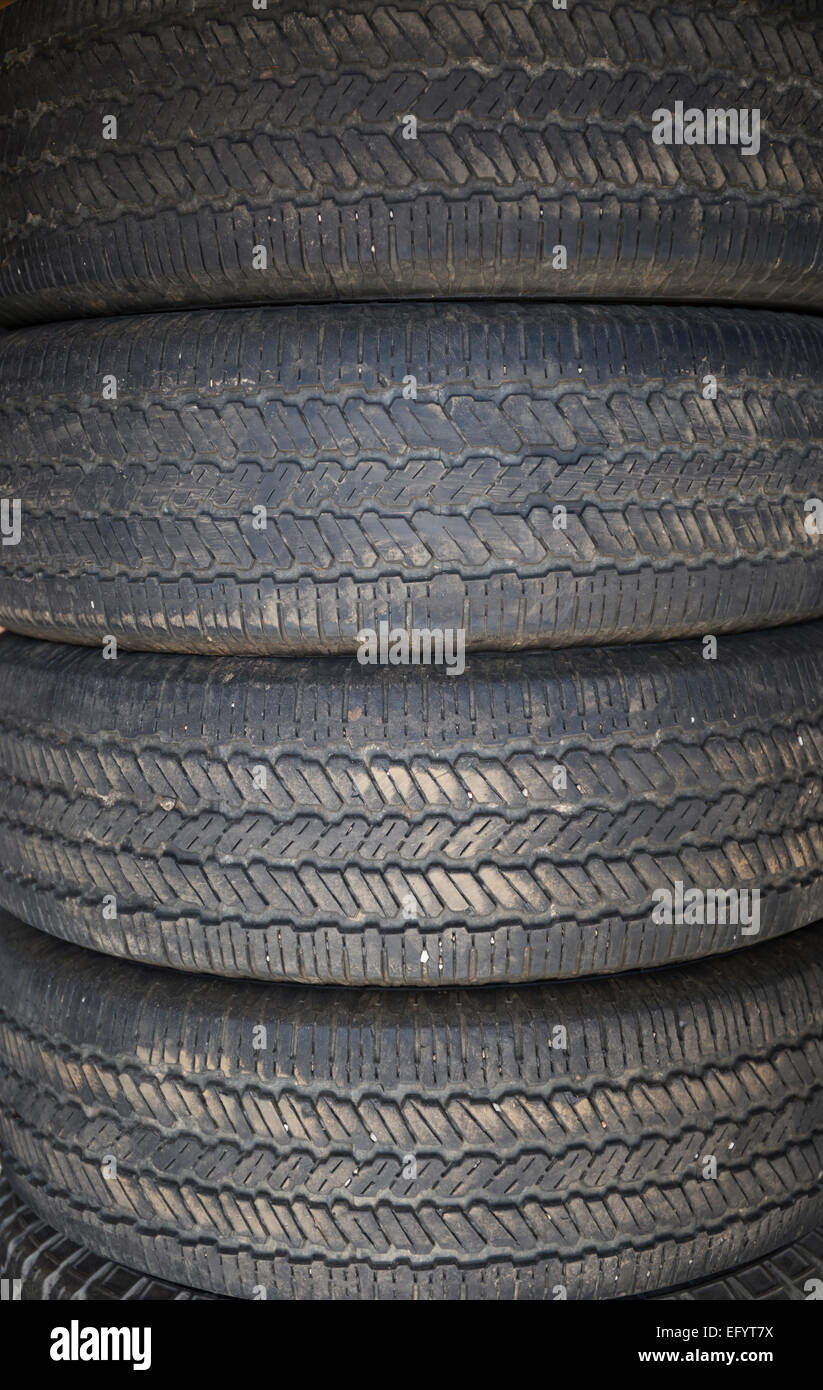 Stack of dirty tires Stock Photo - Alamy
