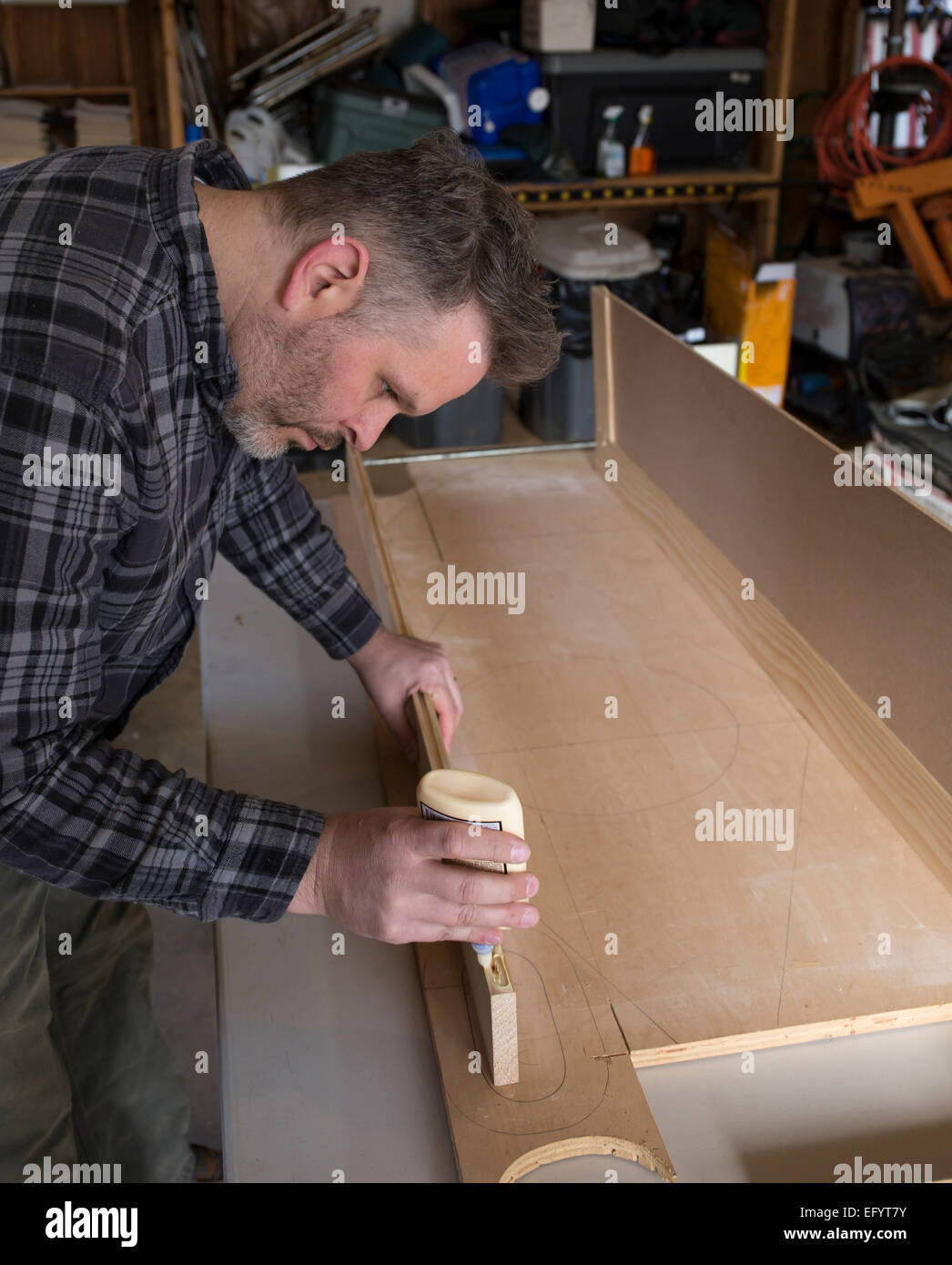 Man constructing woodworking project Stock Photo - Alamy