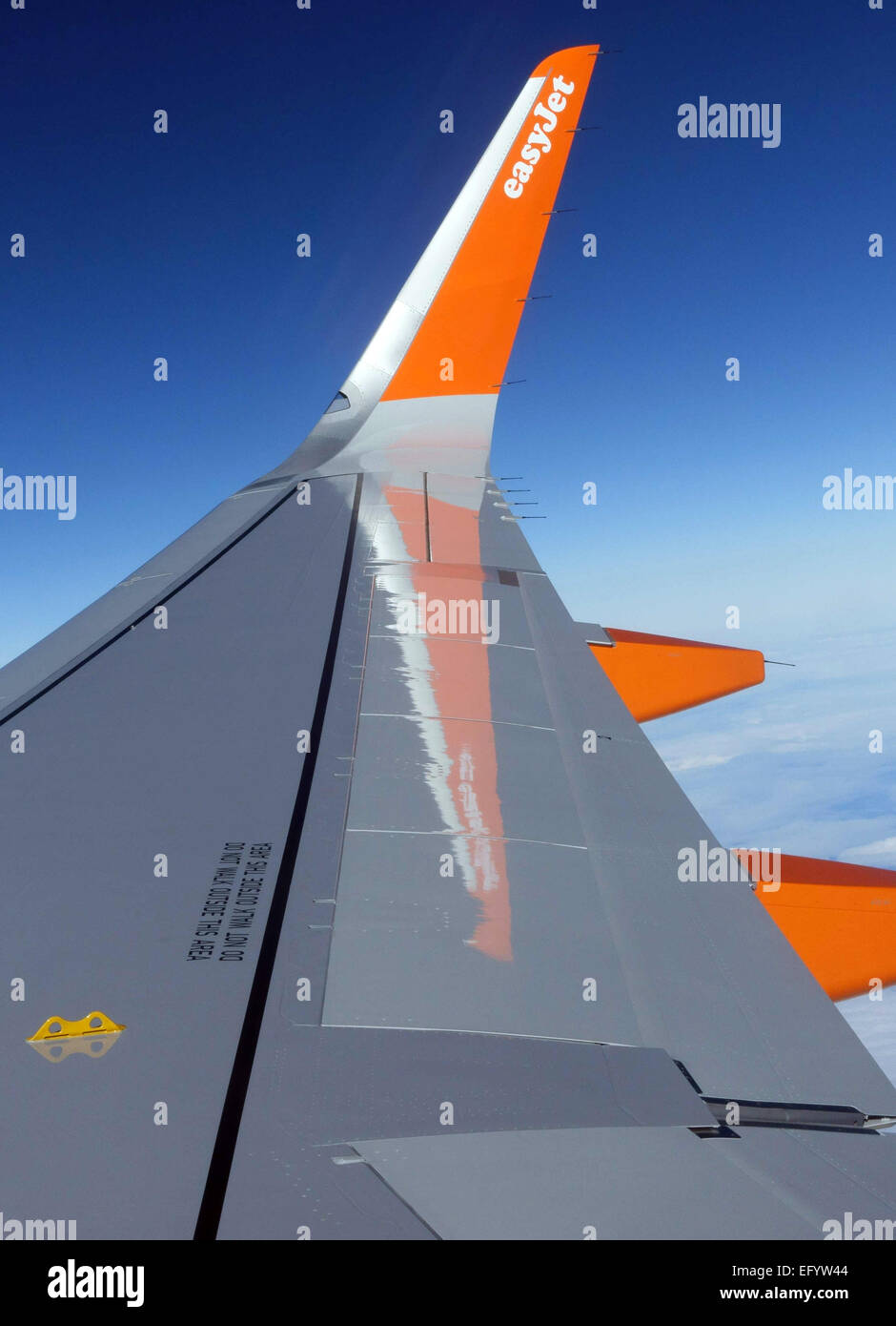 EasyJet logo on wingtip of Airbus A320 aircraft in flight Stock Photo ...