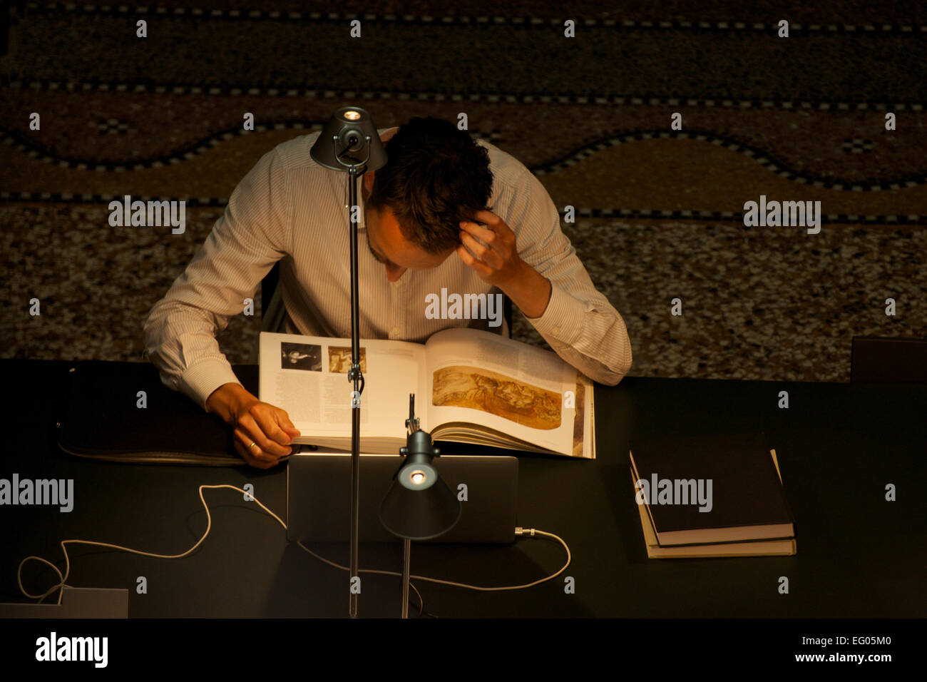 Man reading in study hi-res stock photography and images - Alamy