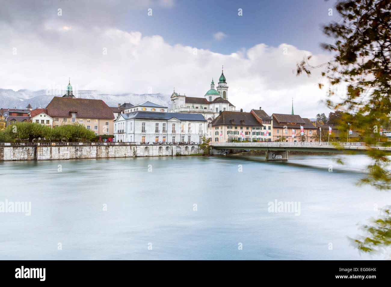 Aare river flowing through the city Solothurn and St. Ursen Cathedral ...