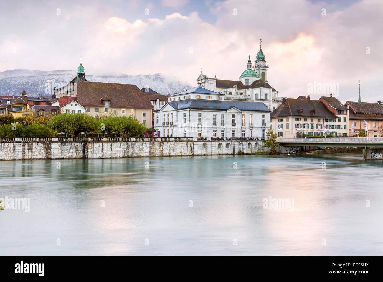 Aare river flowing through the city Solothurn and St. Ursen Cathedral ...