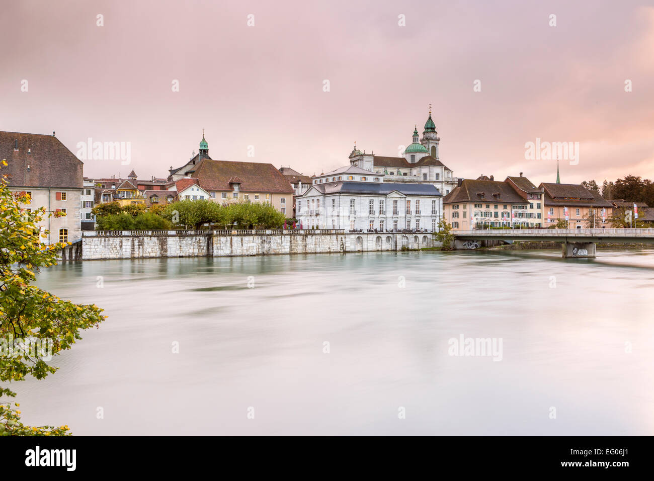 Aare river flowing through the city Solothurn and St. Ursen Cathedral ...