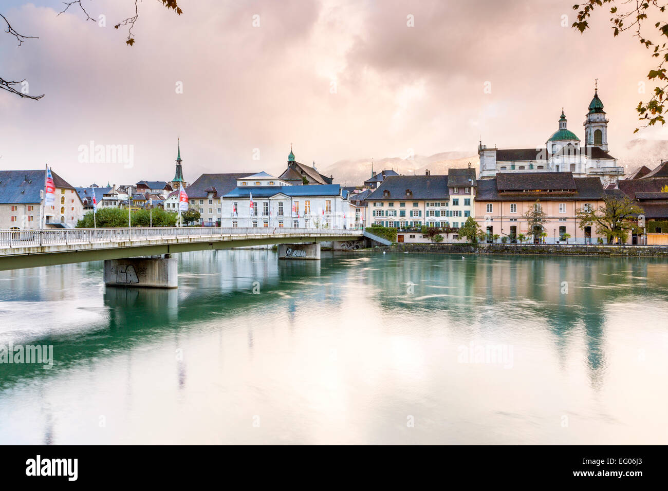 Aare river flowing through the city Solothurn and St. Ursen Cathedral ...