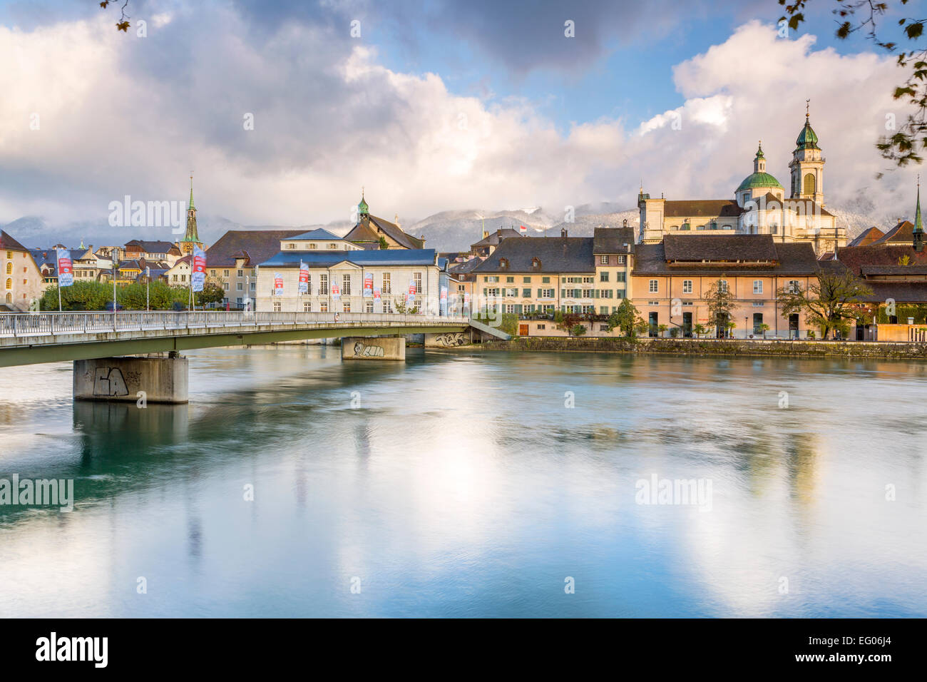 Aare river flowing through the city Solothurn and St. Ursen Cathedral ...