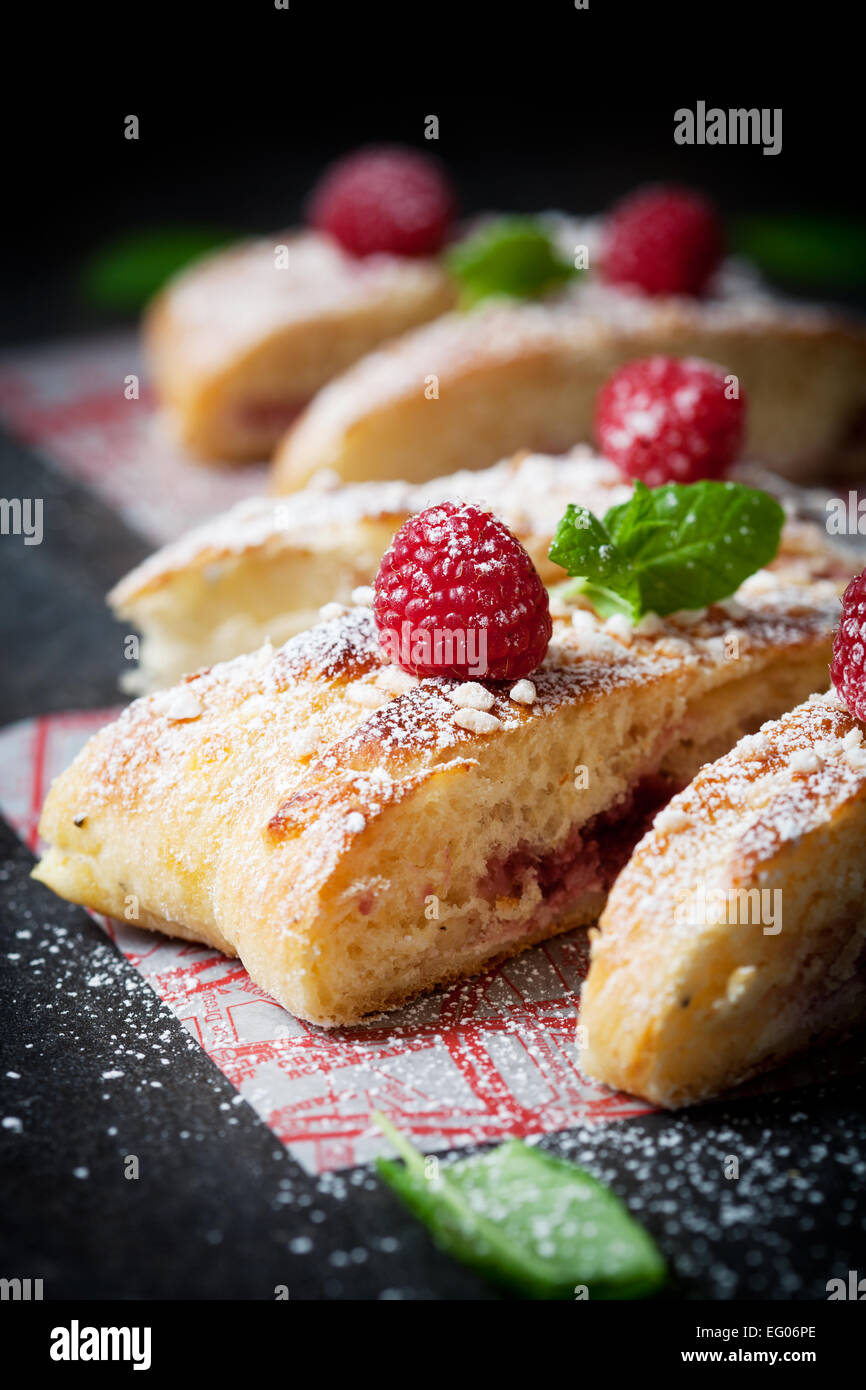 Homemade sweet roll with raspberries and mint Stock Photo - Alamy