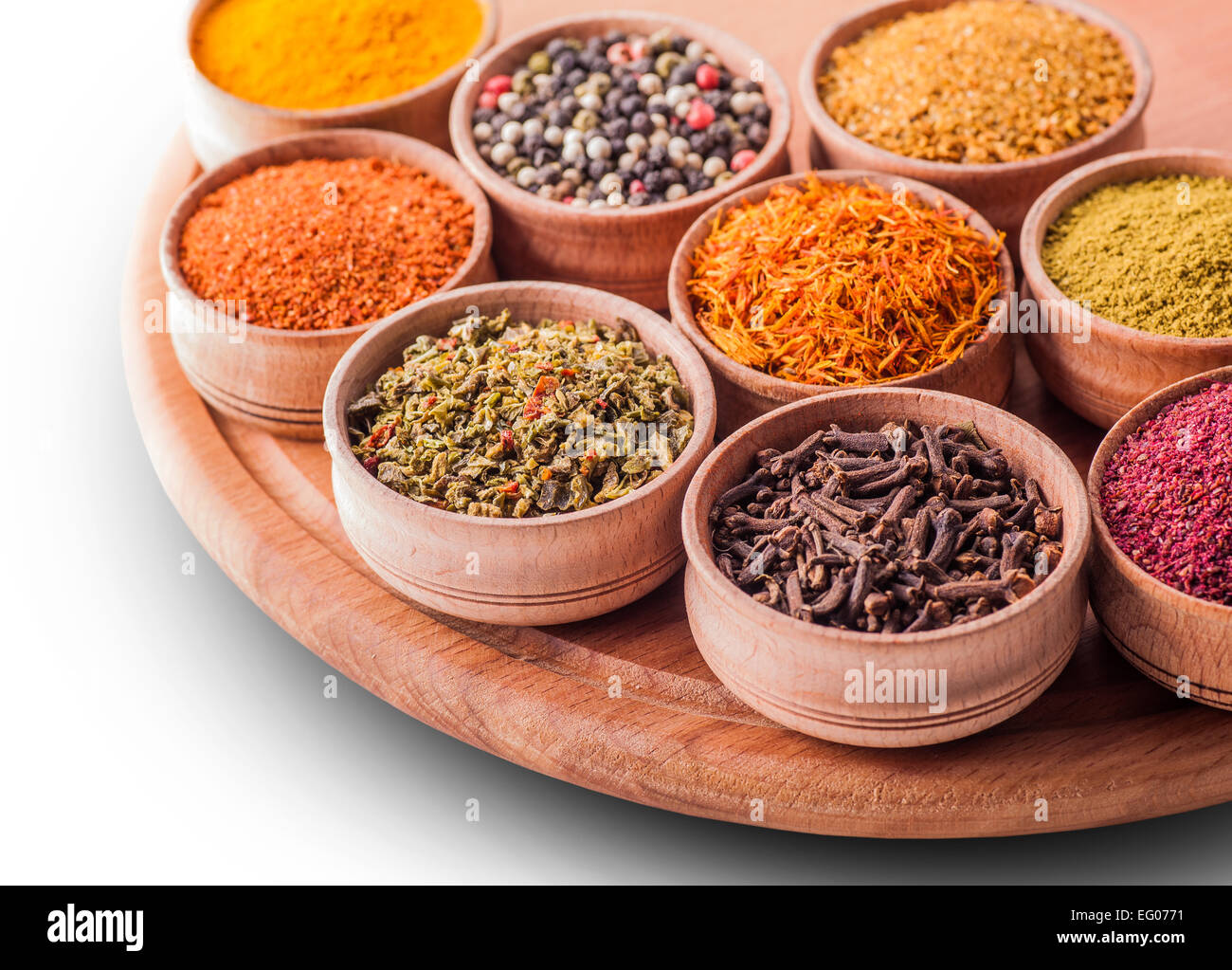 set spices in a wooden bowl close-up on white background Stock Photo ...
