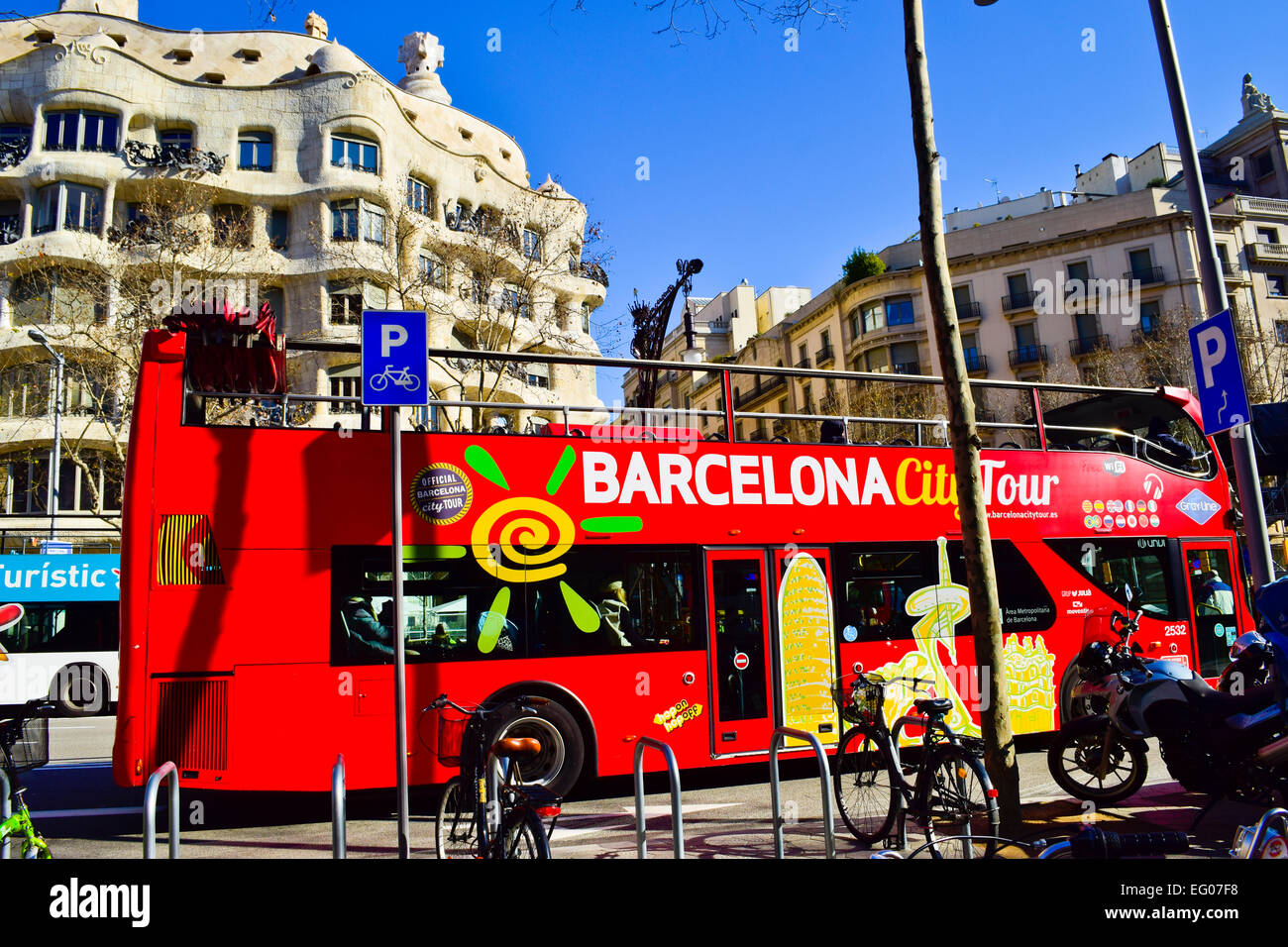 Barcelona city tour bus in a front of Mila house aka La Pedrera ...