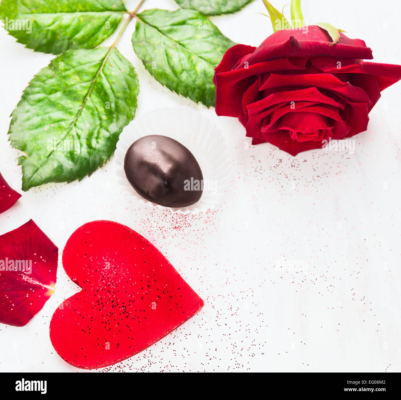 Valentines day border with big red heart, roses and chocolate on white ...