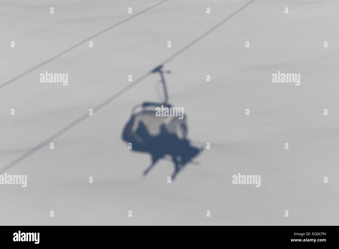 shadow of a skier on a skilift in the alps Stock Photo - Alamy