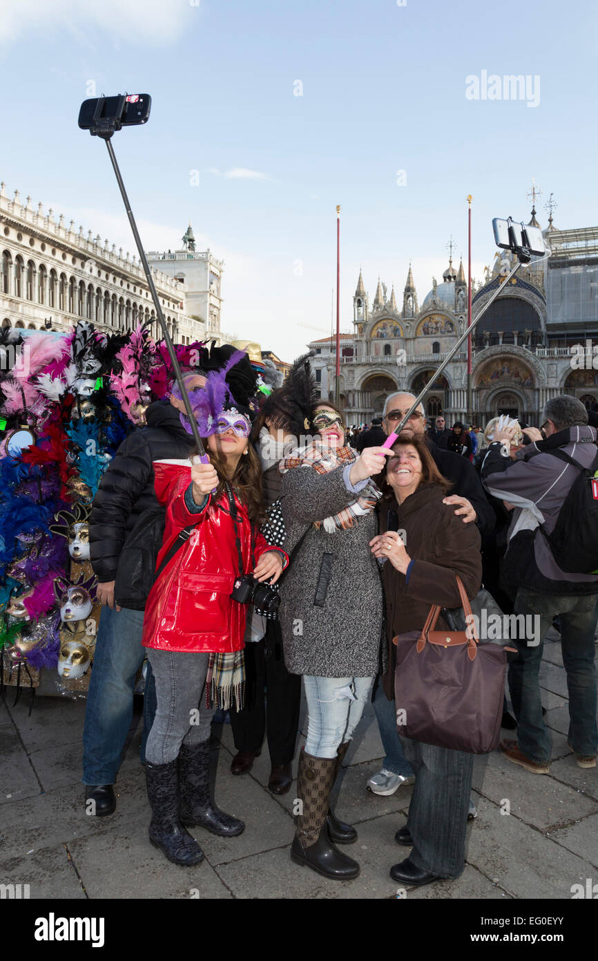 Venice, Italy. People dress in costumes and wear masks as they ...