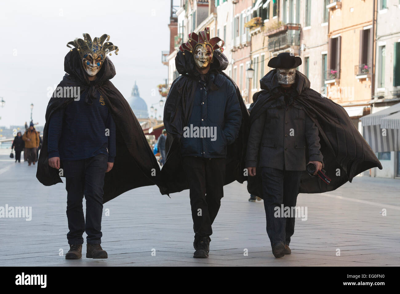 Venice, Italy. People dress in costumes and wear masks as they Stock ...