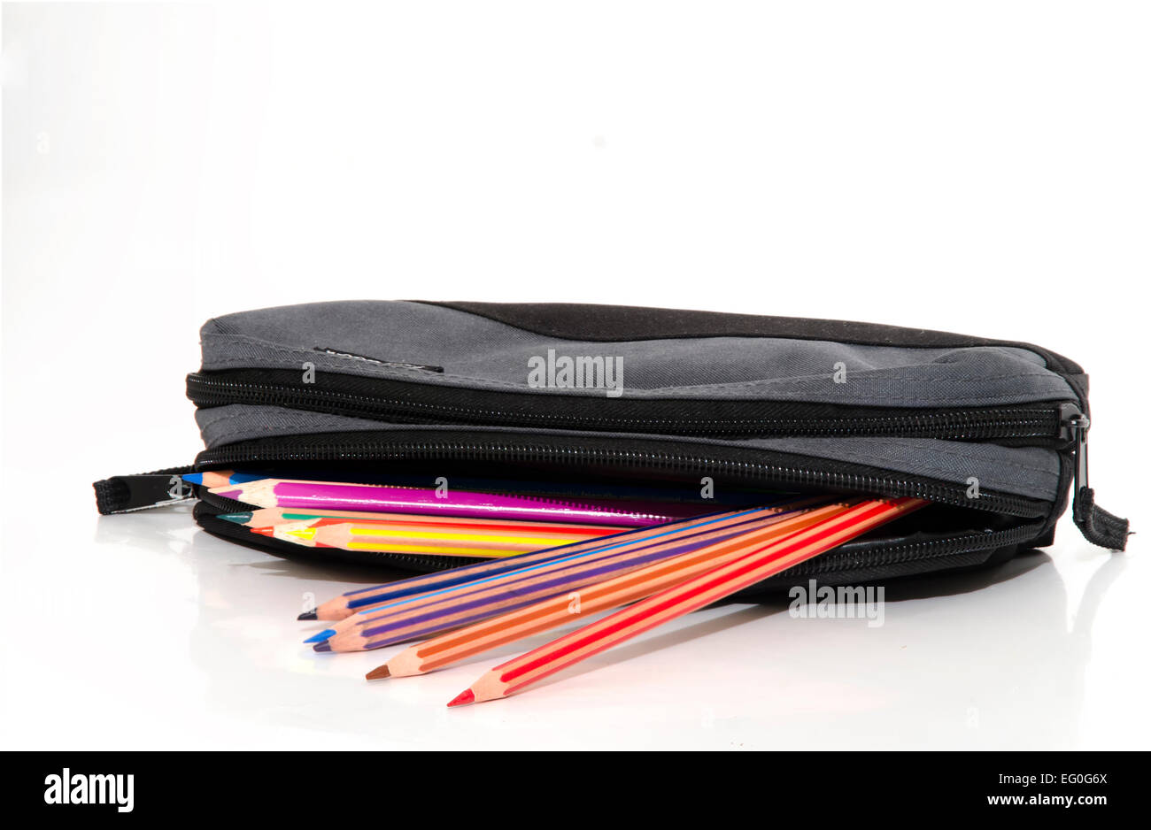 Colored pencils in a pencil case isolated on white background Stock ...