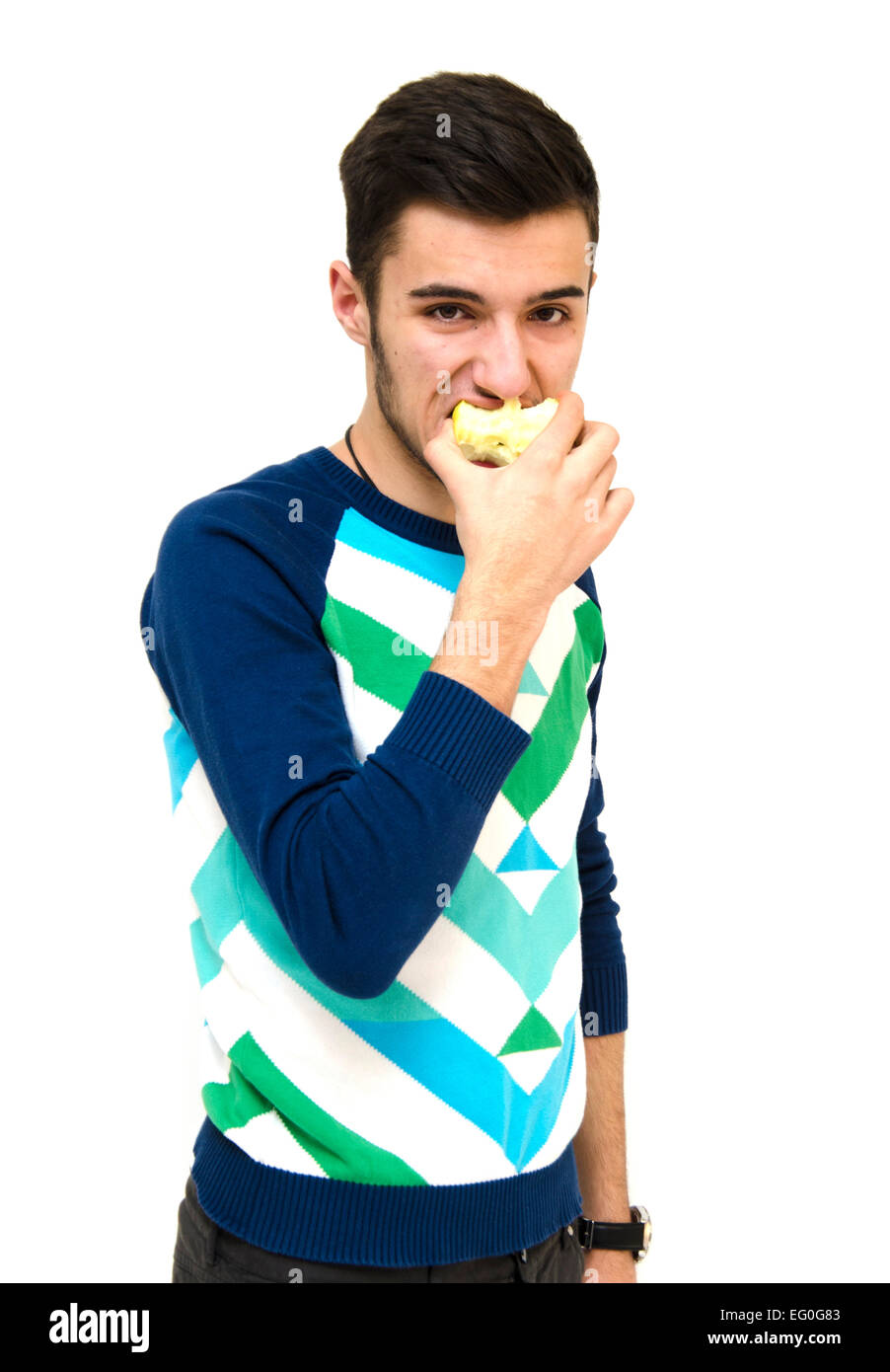 Teenager eating apple isolated on white background Stock Photo - Alamy