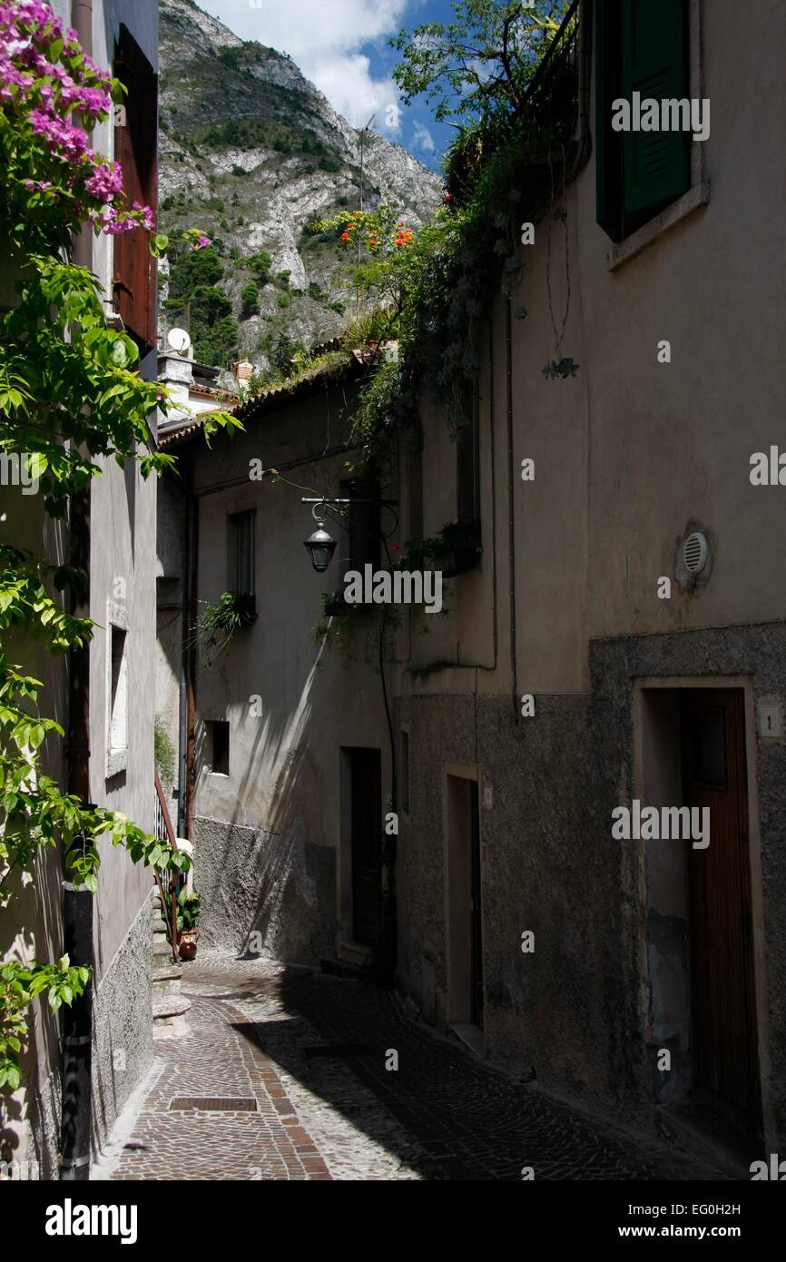 Narrow streets and historic buildings dominate the old town of Limone ...