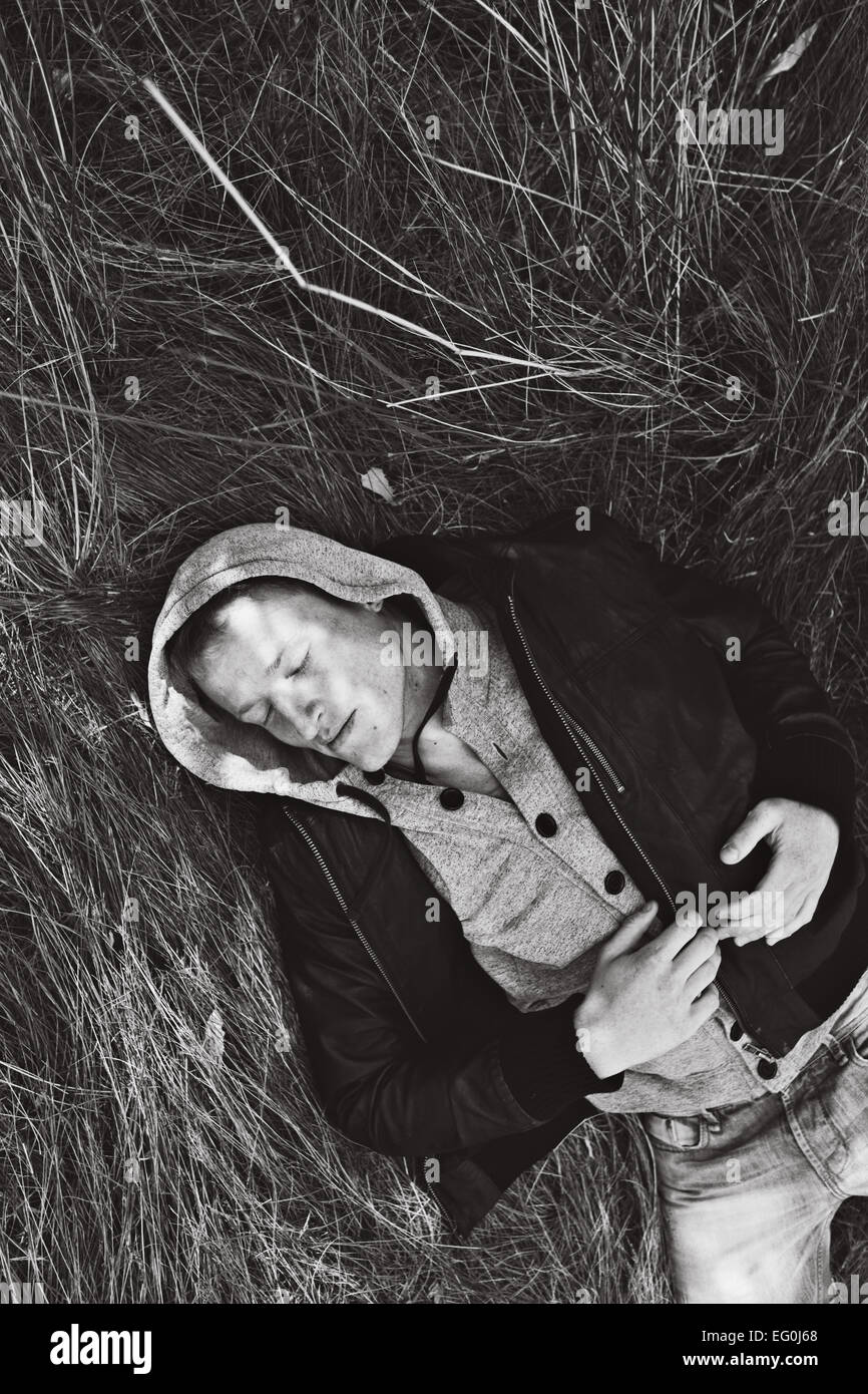 Man lying down sleeping hi-res stock photography and images - Alamy