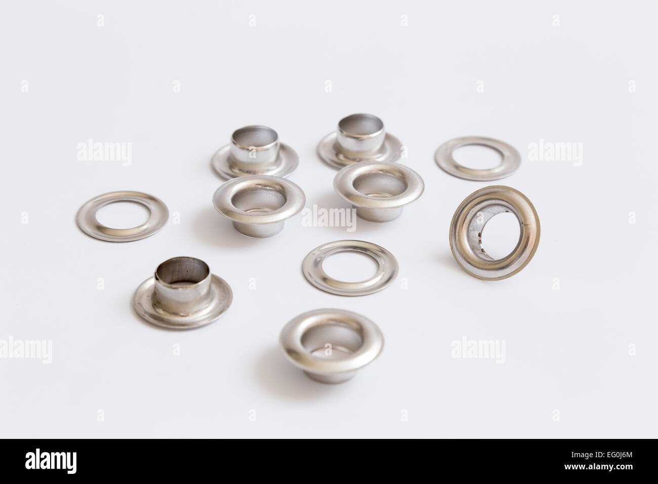 Rivets on a light background Stock Photo - Alamy