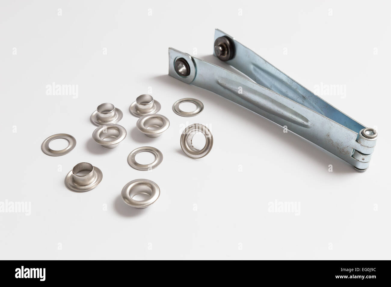 Rivets on a light background Stock Photo - Alamy