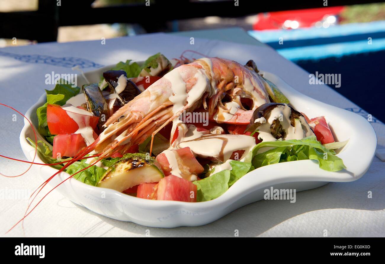 Cooked tiger prawn with salad on white plate Stock Photo - Alamy