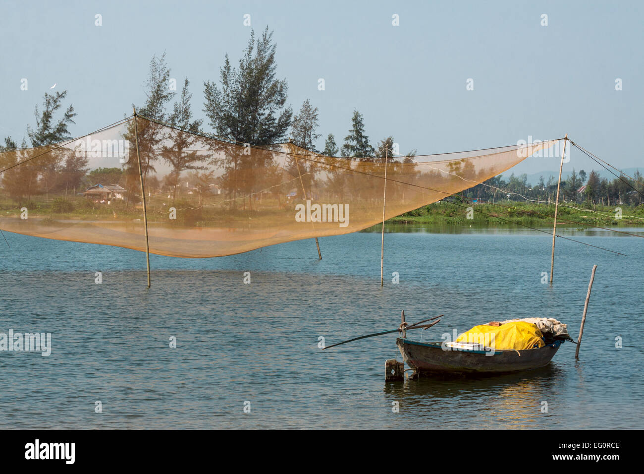 Fishing boat and net near Hoi An, Vietnam, Asia Stock Photo - Alamy