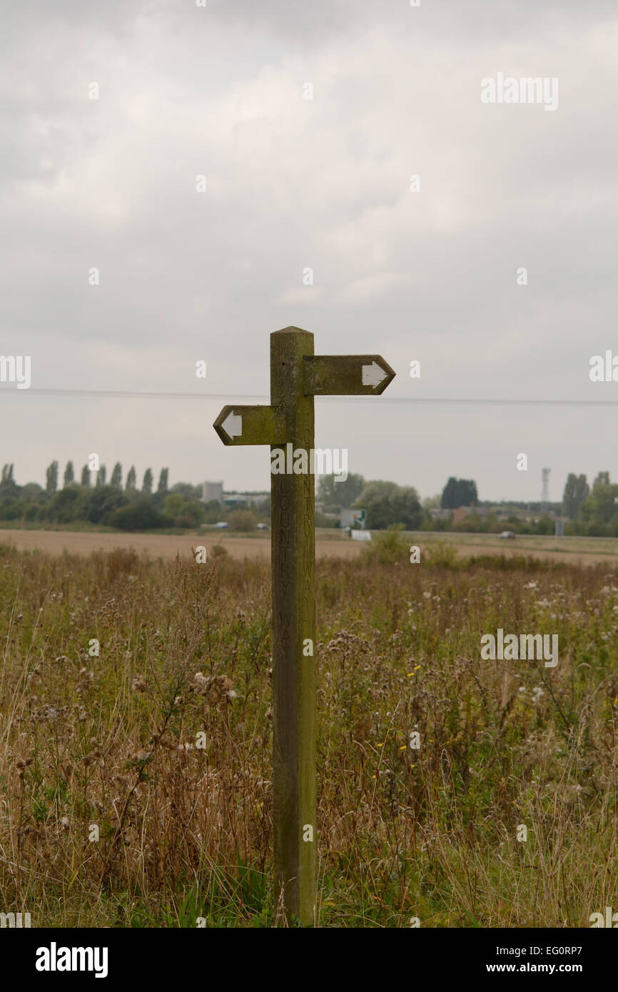Wooden direction post with arms pointing in different directions Stock ...