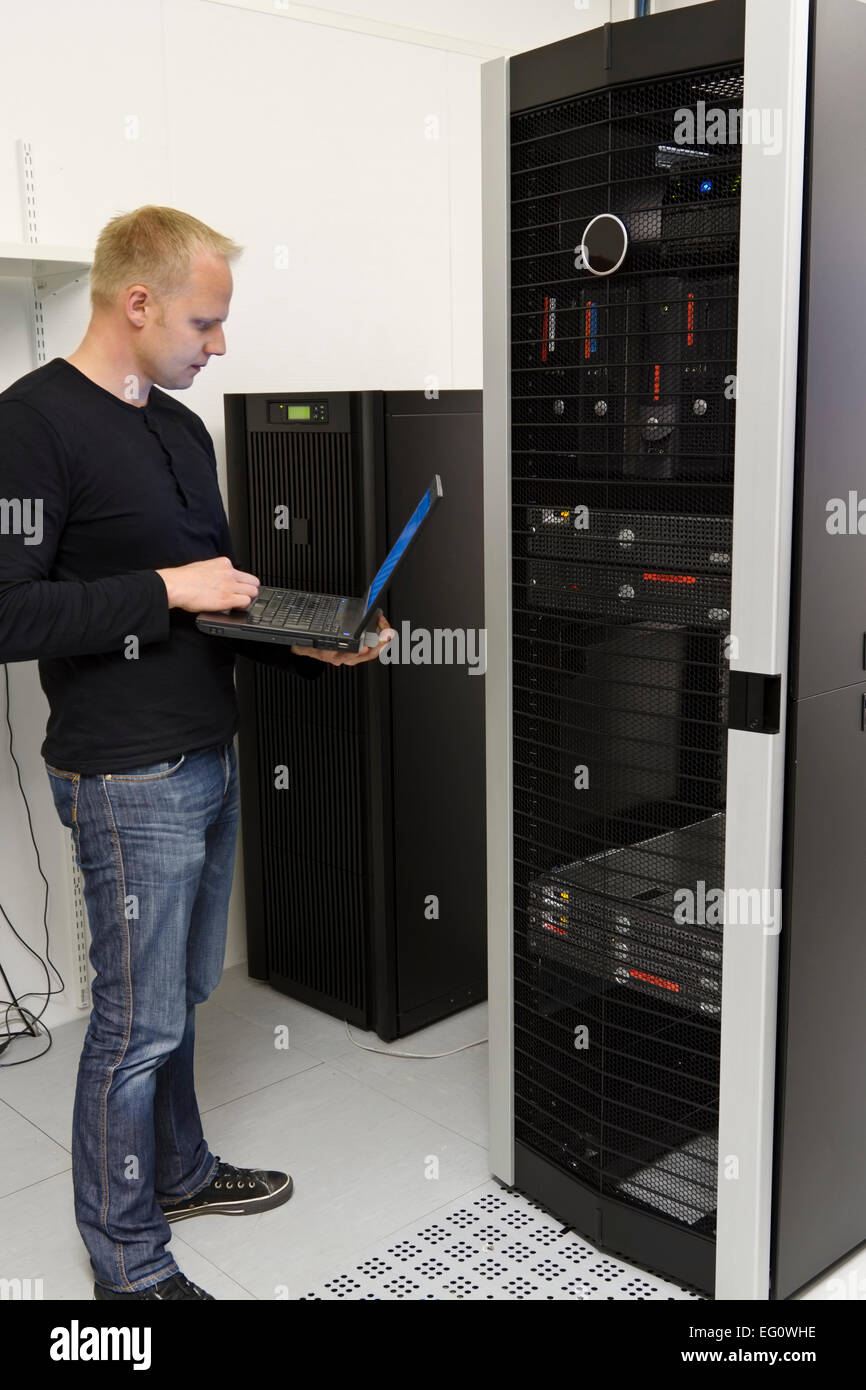 Data systems vertical hi-res stock photography and images - Alamy