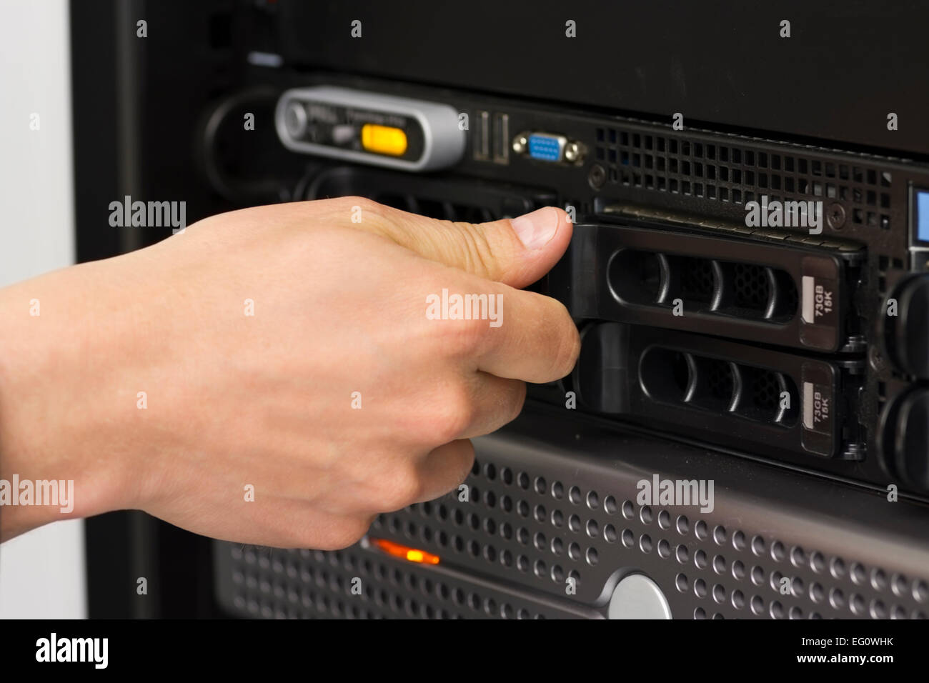 IT technician / consulant insert / remove a harddisk from a blade ...