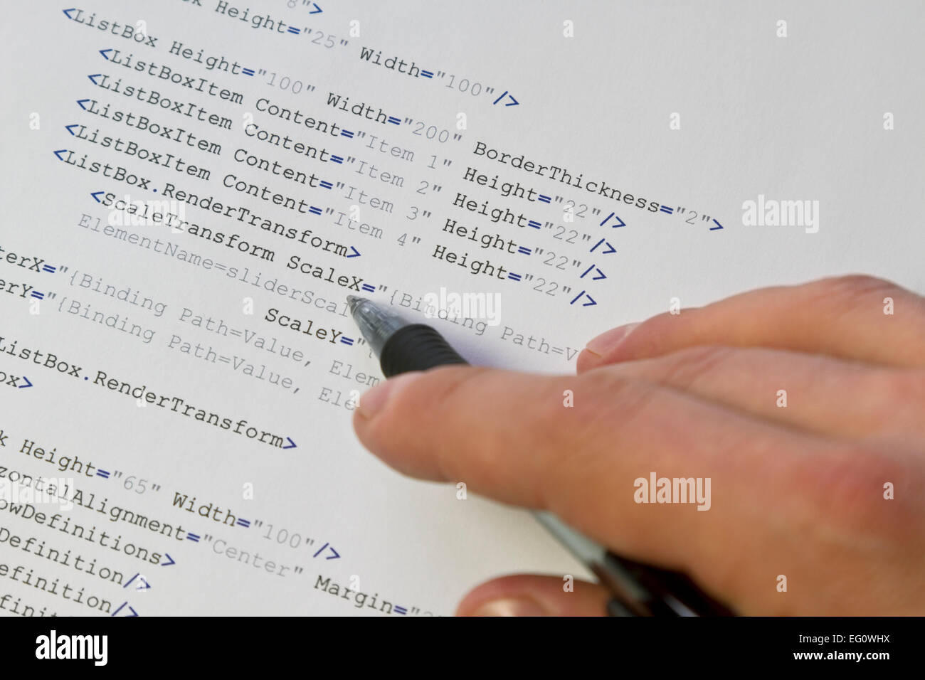 A Programmer Man Pointing With His Pen At Software Computer Code Software Application