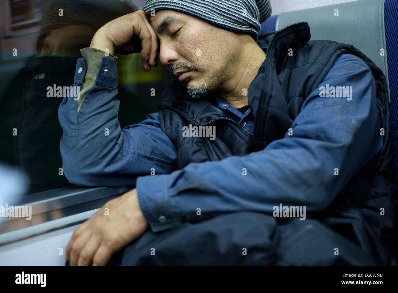 Commuters sleeping on the Tokyo Subway. The subway carries some 8 ...