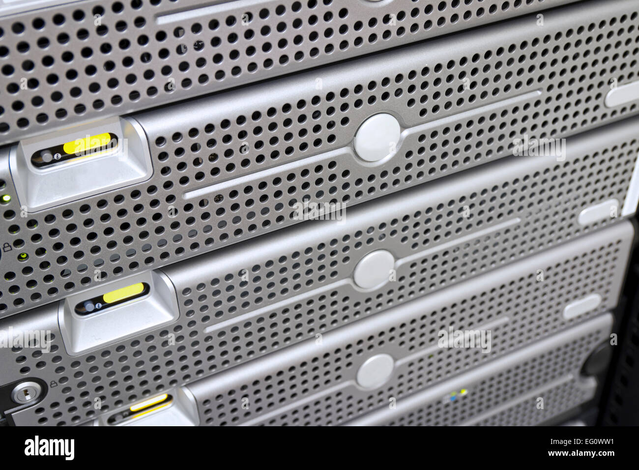 Some servers and a disk cabinet / SAN mounted in a rack. Shot in a data ...