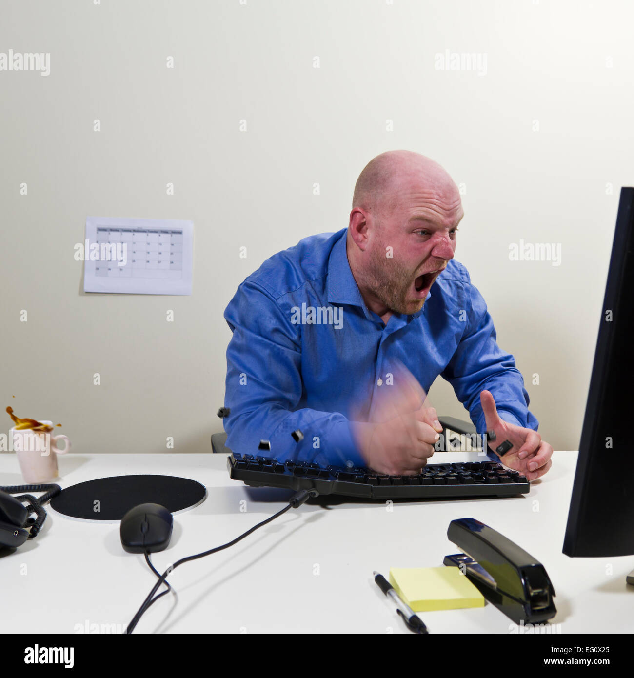 Angry office worker hi-res stock photography and images - Alamy