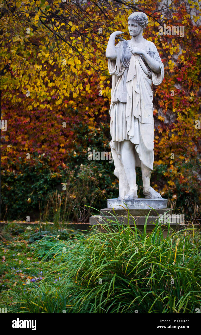 Mythological classical statue with autumnal leaves Stock Photo - Alamy